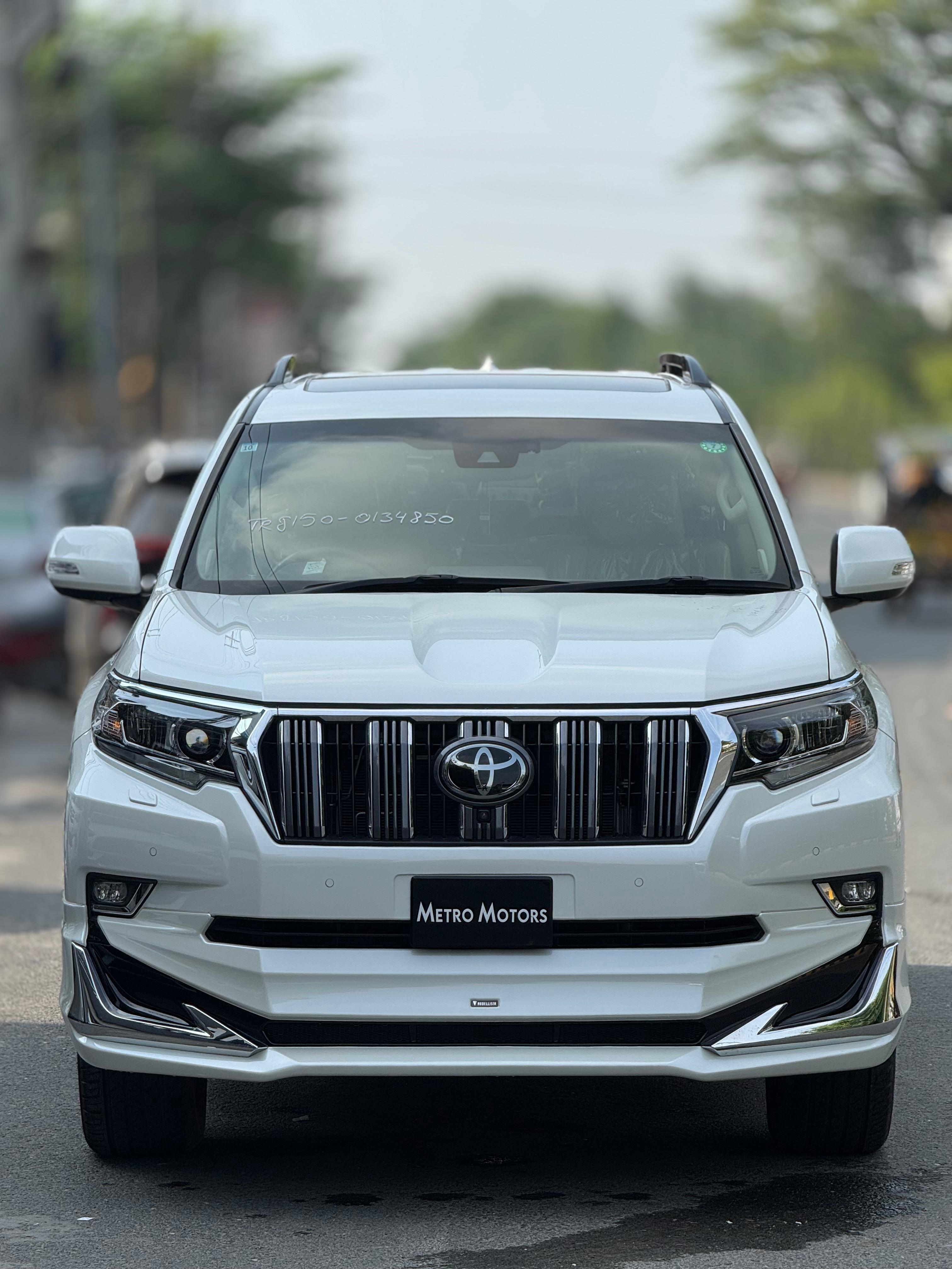 Prado TXL white – MetroMotors.pk